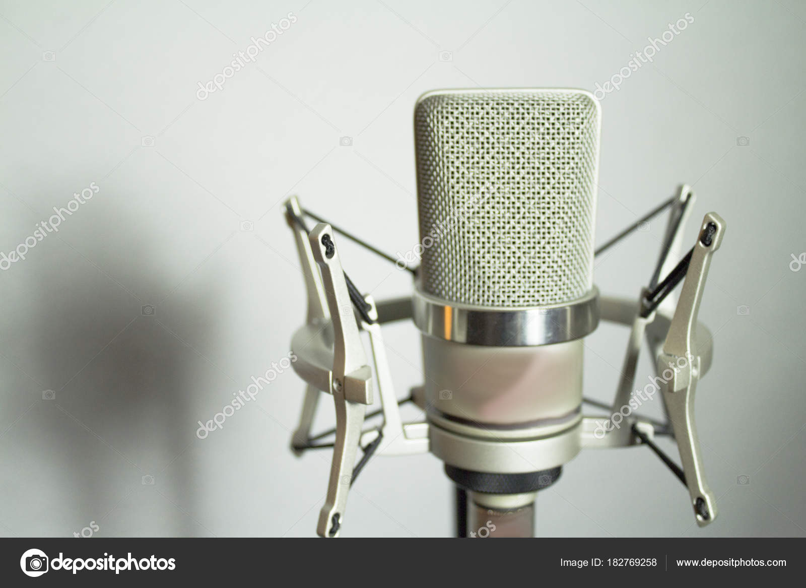 Silver microphone on white background Stock Photo by ©GemaIbarra 182769258