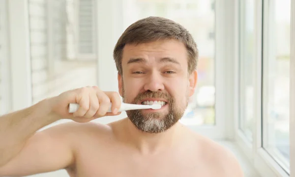Men brush their teeth Stock Photos, Royalty Free Men brush their teeth ...