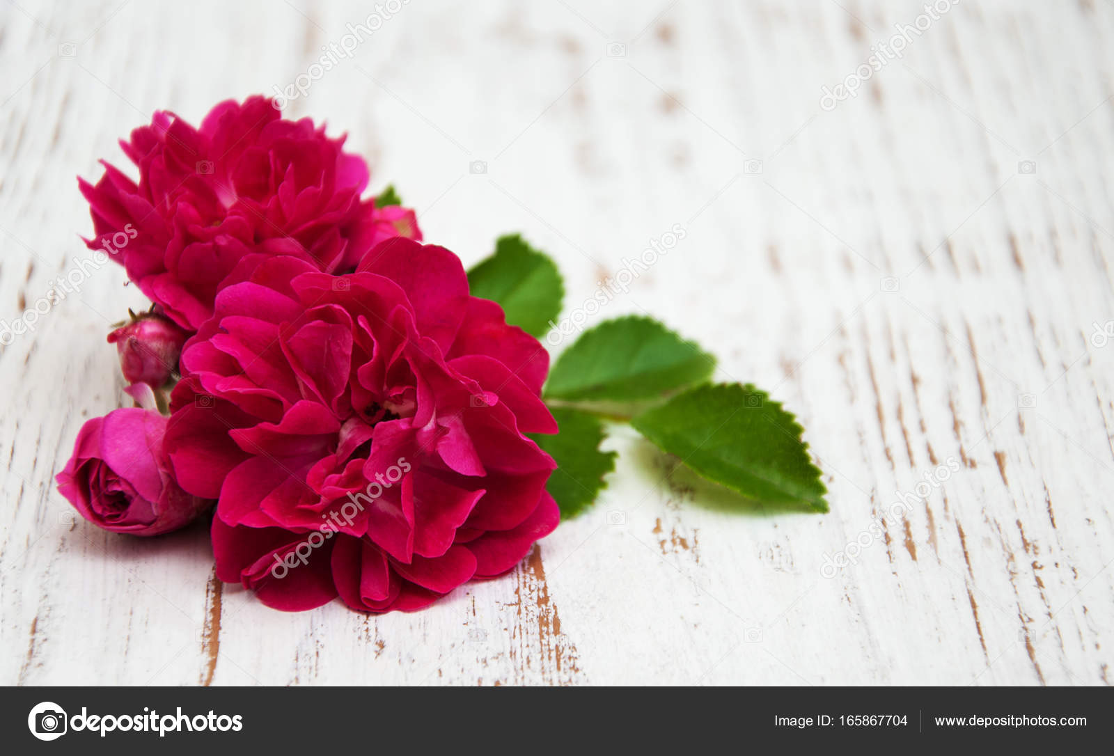 Pink roses on a table Stock Photo by ©Almaje 165867704