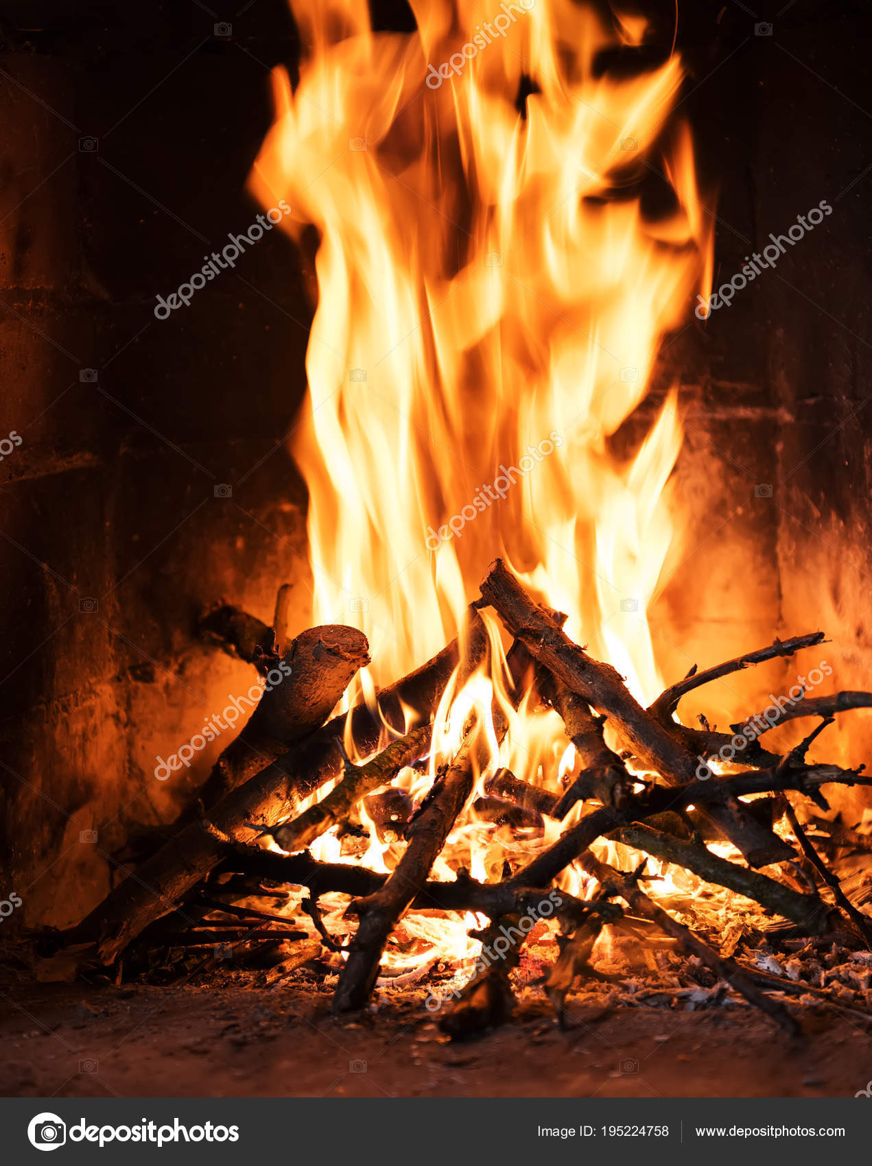 A fire burns in a fireplace — Stock Photo © Almaje #195224758