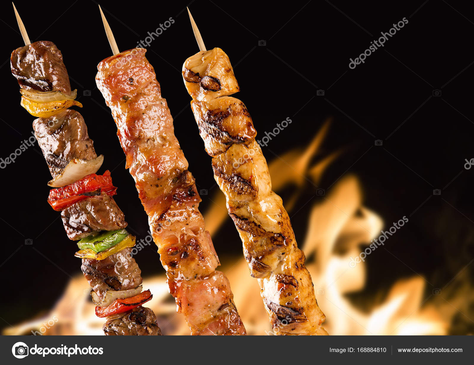 Assorted steak skewers on a fire background Stock Photo by ©Paulovilela ...