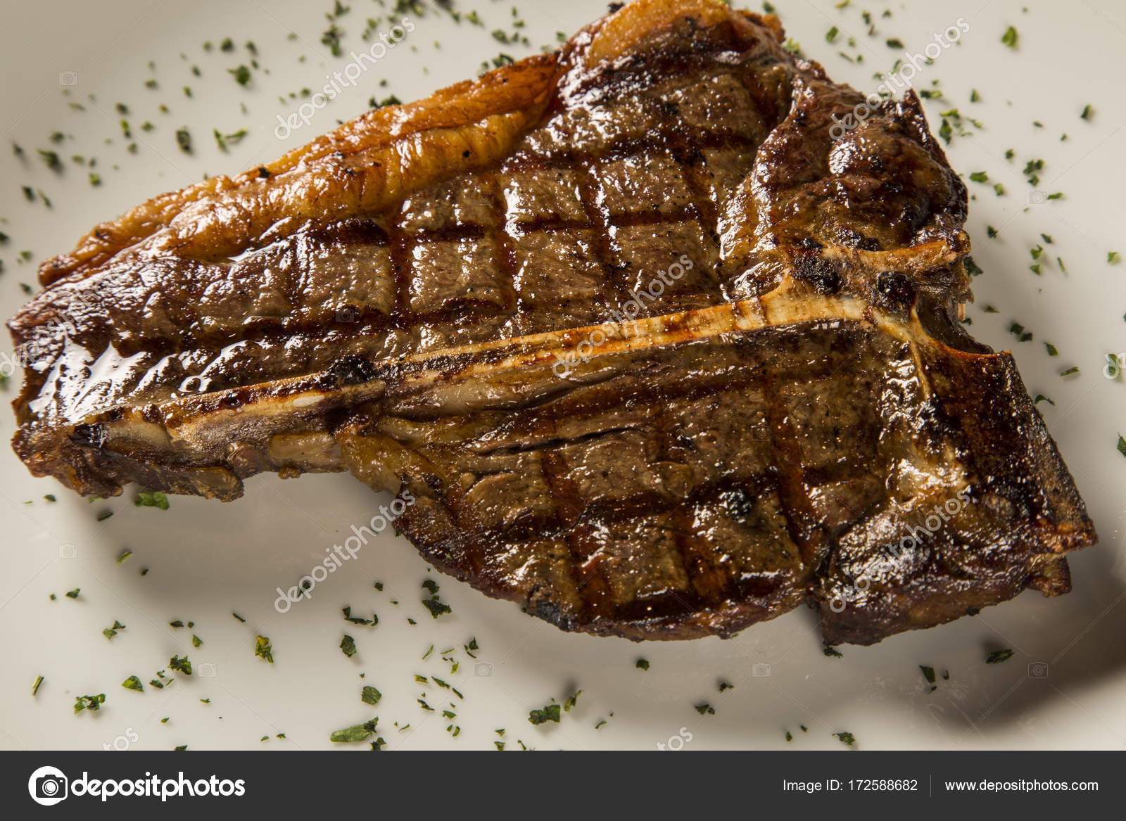 Prime ribs on the white plate. Stock Photo by ©Paulovilela 172588682