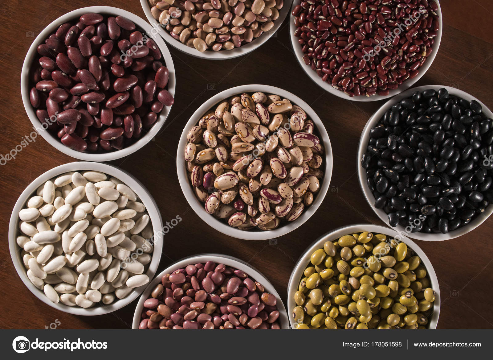 Assorted beans in bowls on wood background Stock Photo by ©Paulovilela ...