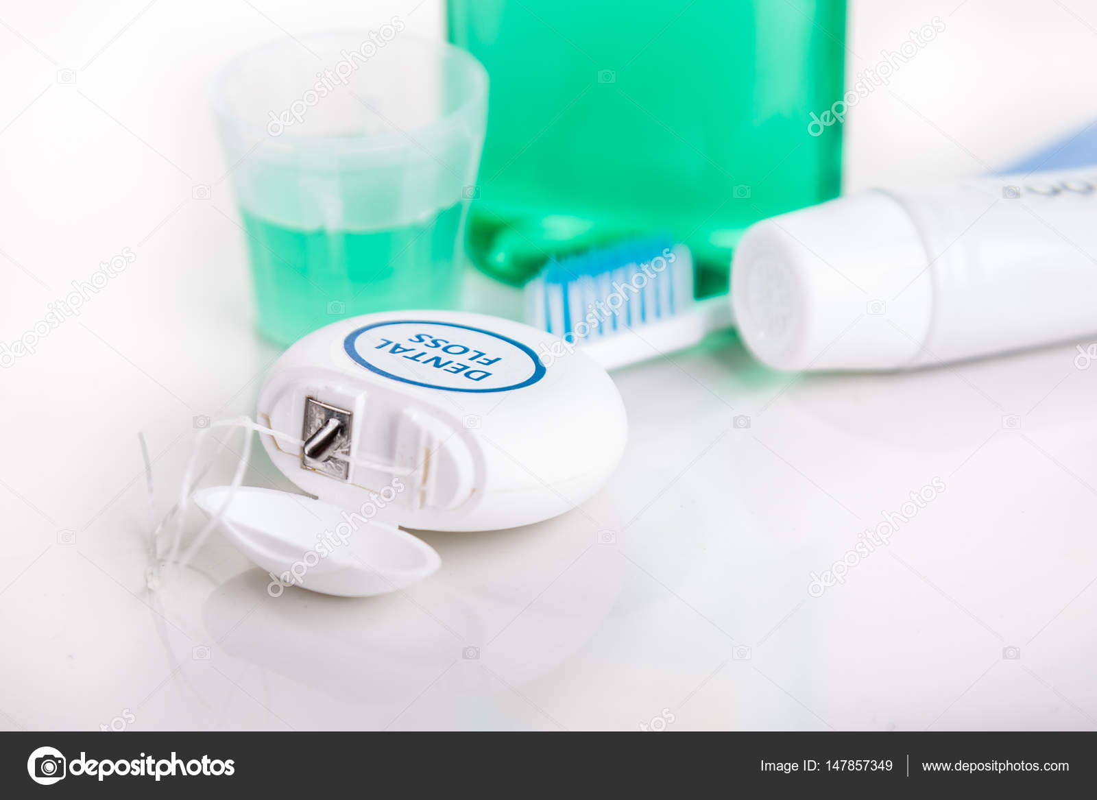 Toothbrush And Toothpaste And Floss