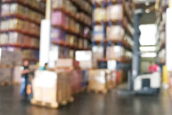 De-focused warehouse racks with inventory - Stock Image - Everypixel