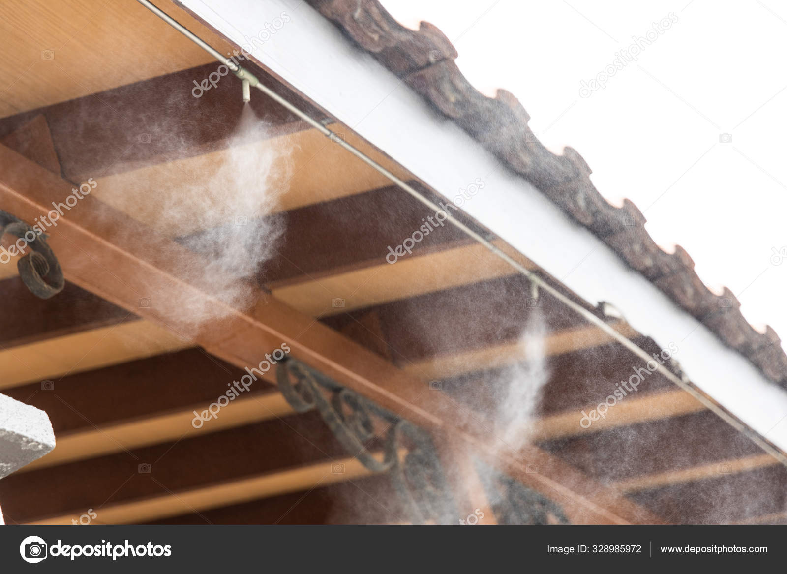 Mist cooling system on commercial building to manage ambient ...