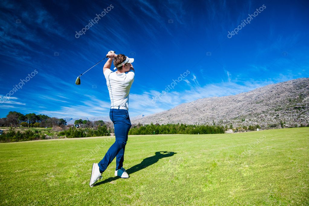 Golfer playing a shot on the fairway — Stock Photo © danedwards #127617260