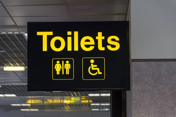 Airport toilet sign Stock Photos, Royalty Free Airport toilet sign ...