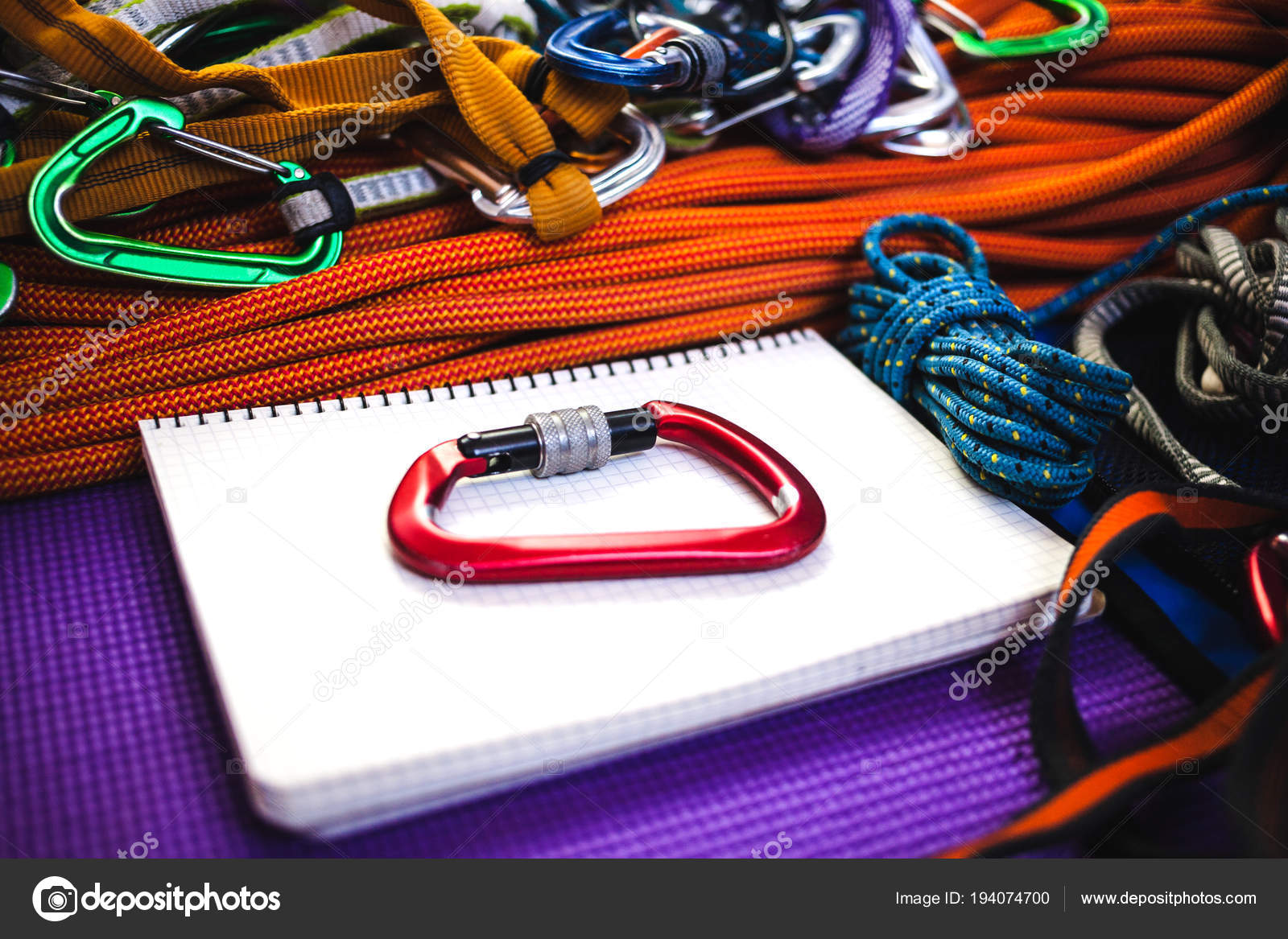 Notepad, rope and carbine. — Stock Photo © zhukovvvlad #194074700