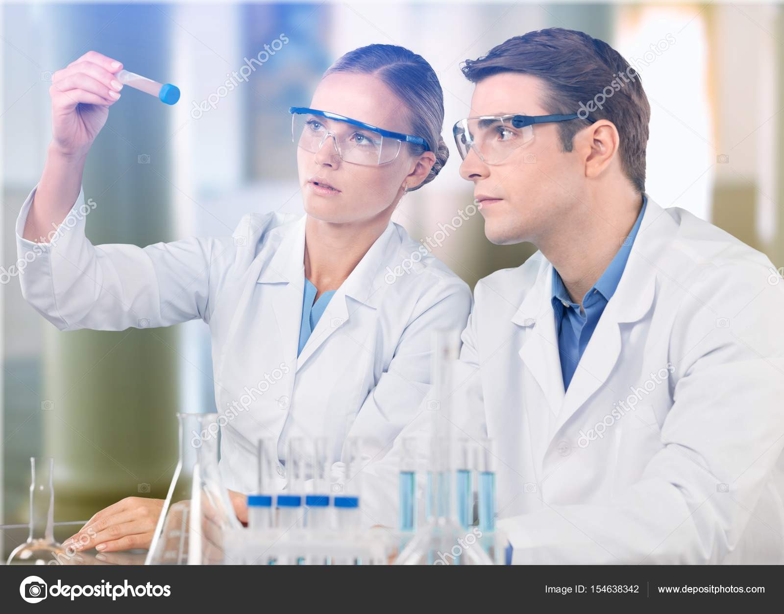 Two scientists conducting research Stock Photo by ©billiondigital 154638342 Two scientists conducting research Stock Photo by ©billiondigital 154638342