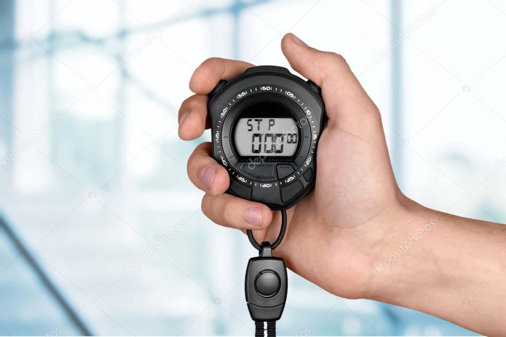 Man hand holding stopwatch — Stock Photo © billiondigital #154637628
