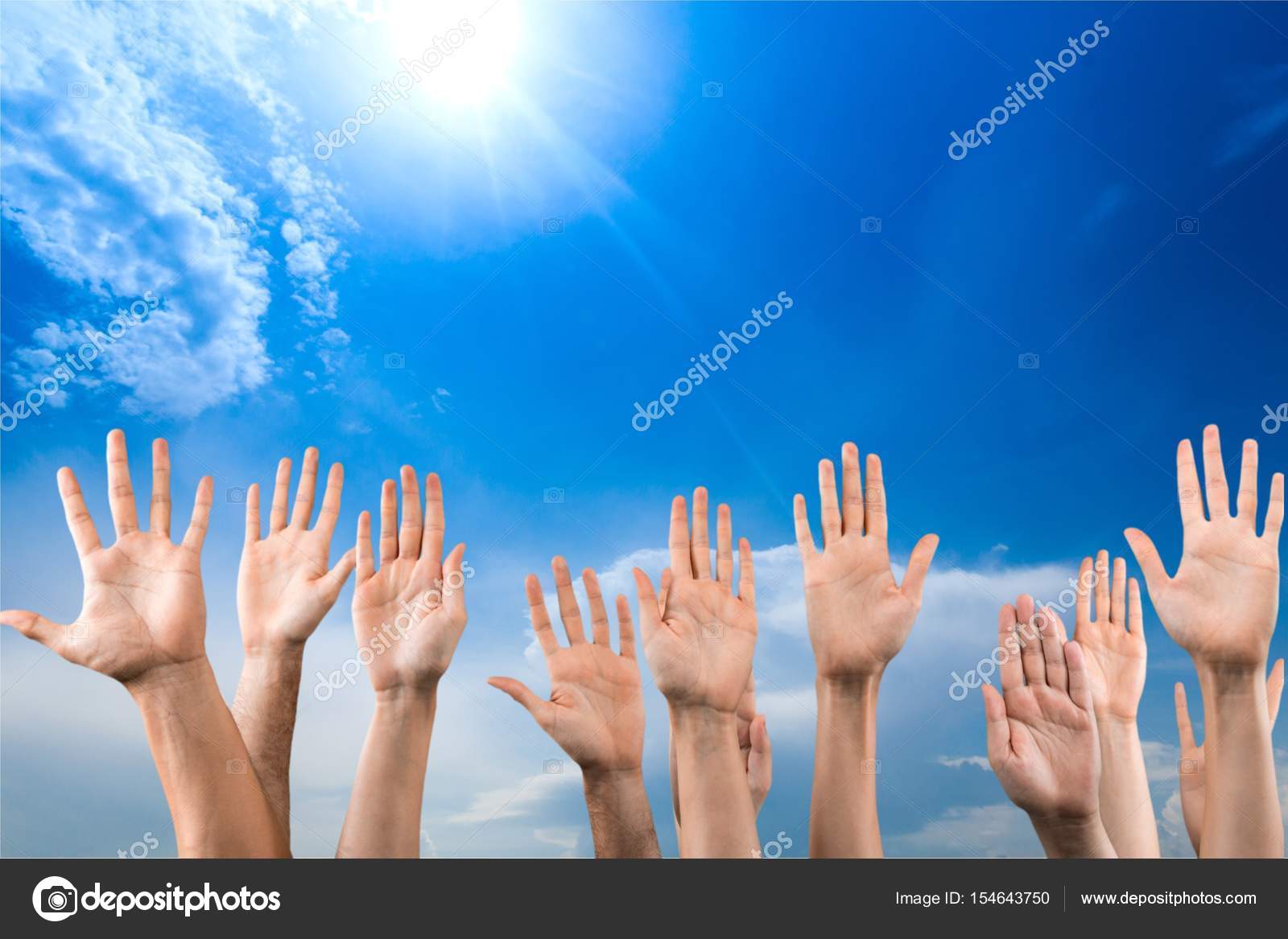 Human hands on blue sky Stock Photo by ©billiondigital 154643750