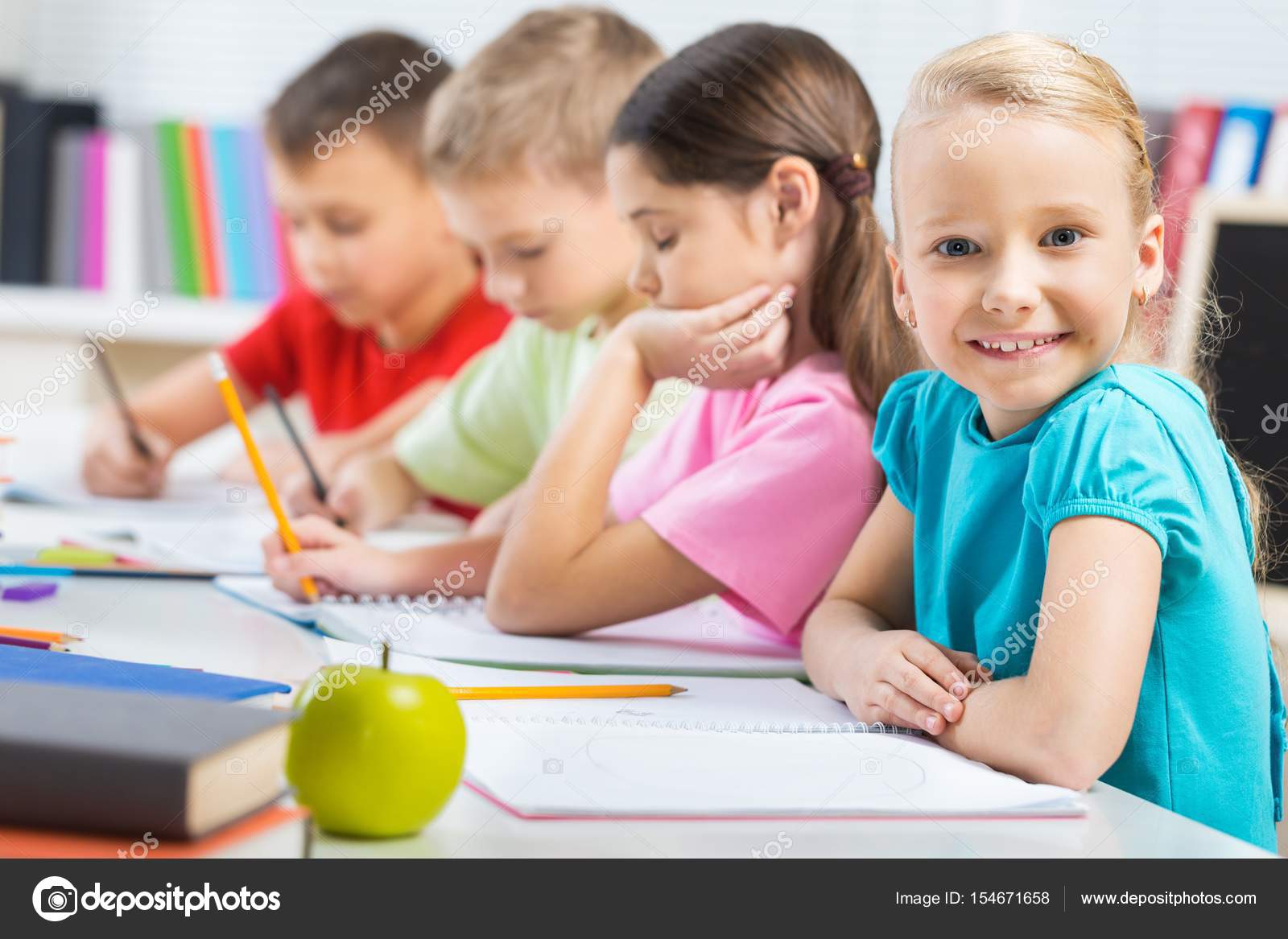 Little girl on painting lesson in school — Stock Photo © billiondigital ...