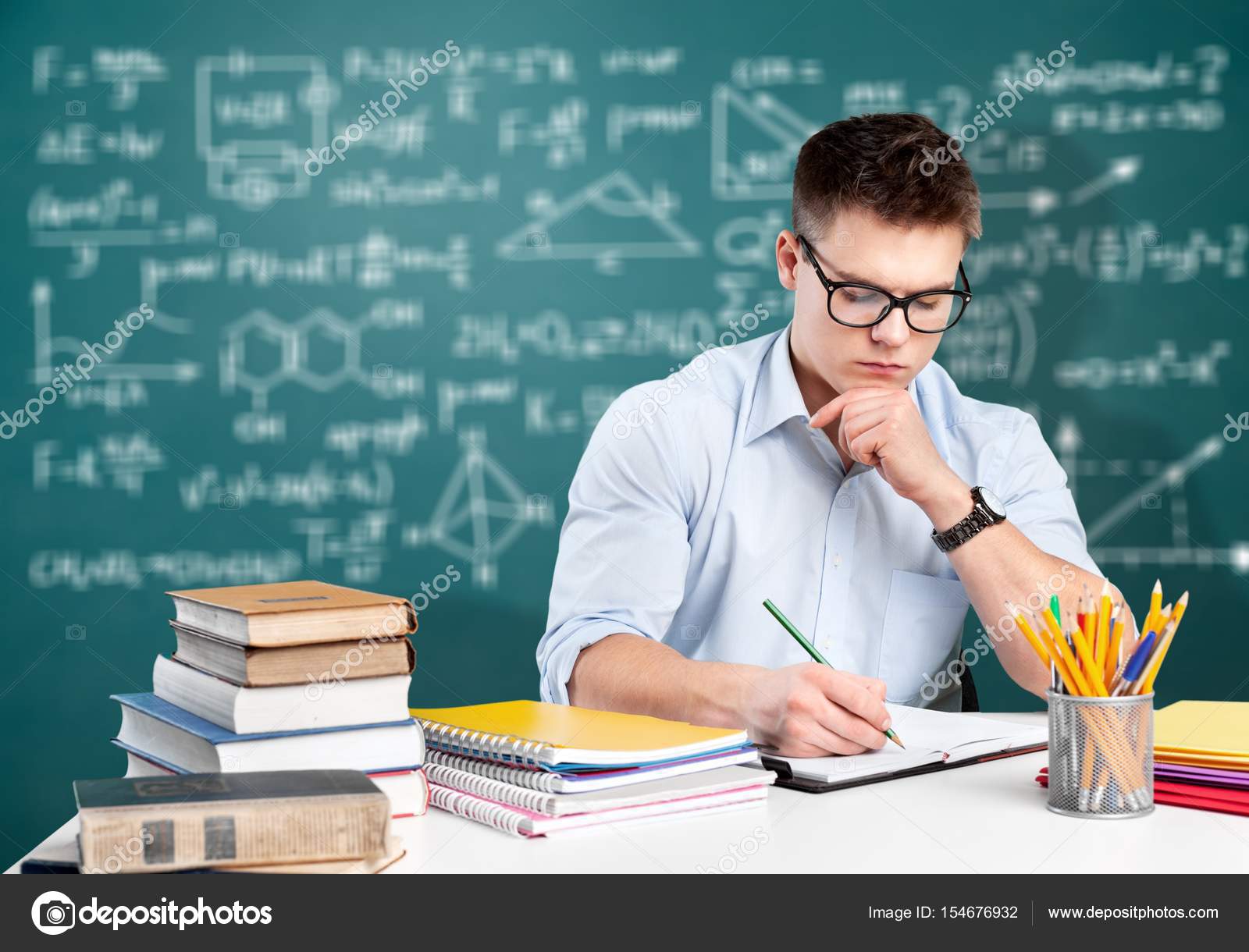Man studying in school Stock Photo by ©billiondigital 154676932 Man studying in school Stock Photo by ©billiondigital 154676932