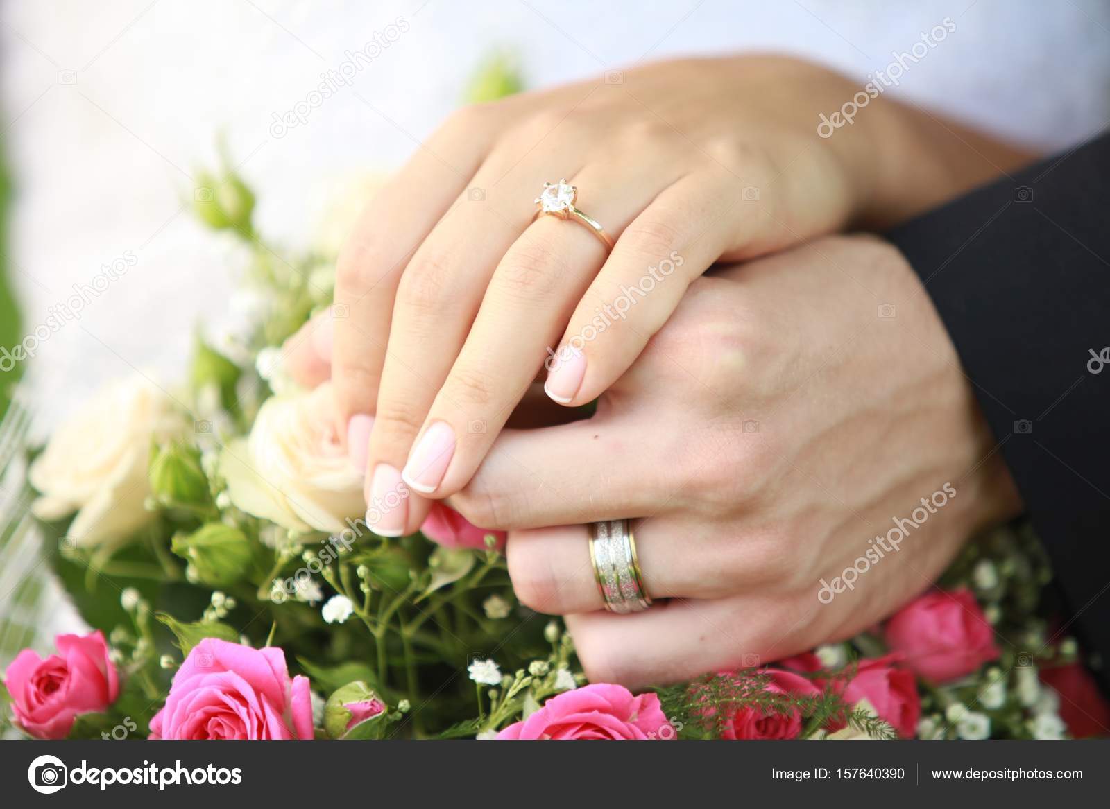 Couple Wedding Rings On Hands