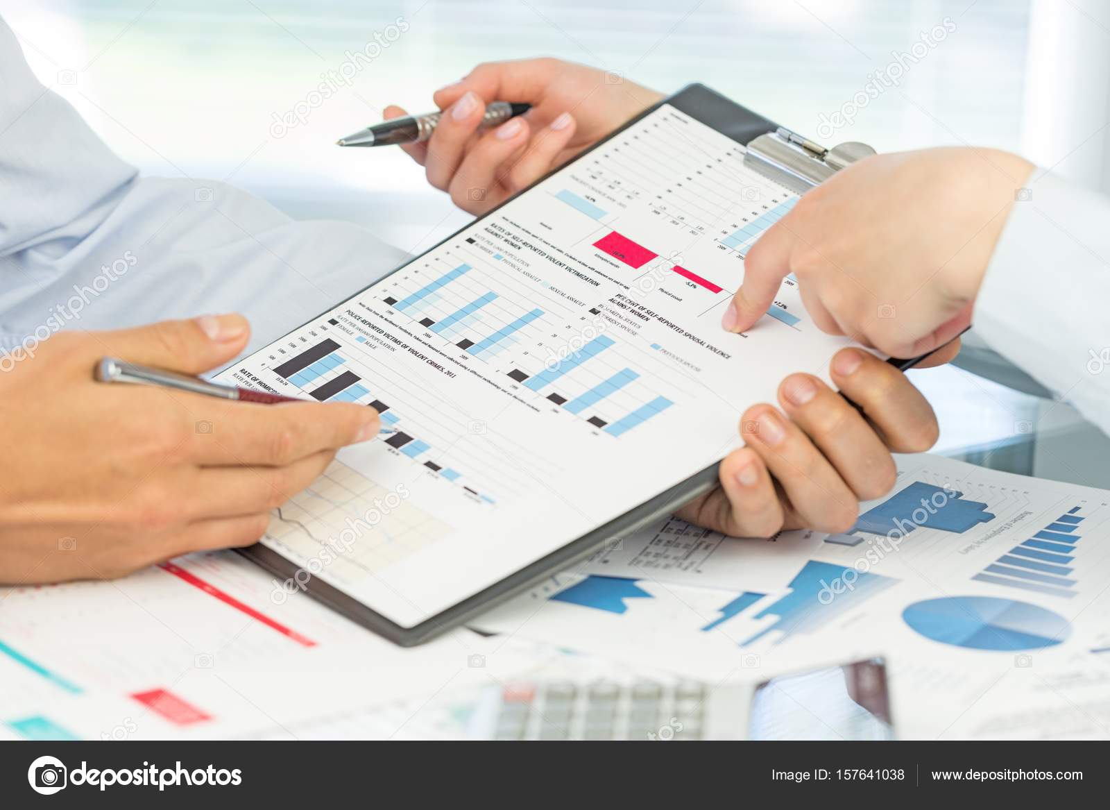 Business people making report Stock Photo by ©billiondigital 157641038