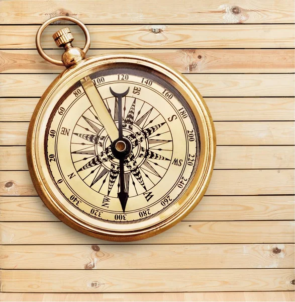 Old compass on ancient map — Stock Photo © galdzer #5198692