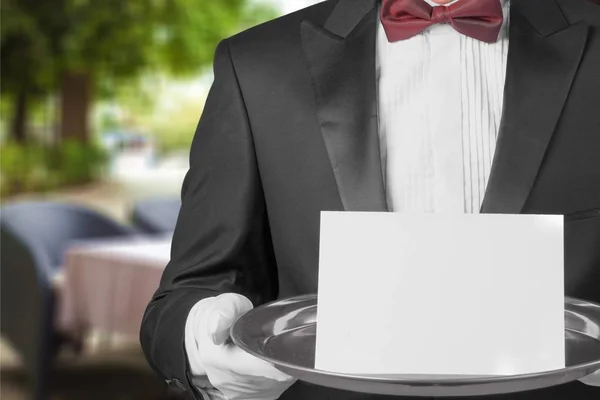 Waiter holding card Stock Photos, Royalty Free Waiter holding card ...