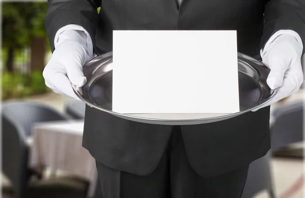 Waiter holding card Stock Photos, Royalty Free Waiter holding card ...