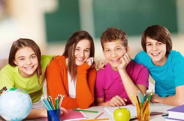 Friendly school children at school Stock Photo by ©billiondigital 118715702