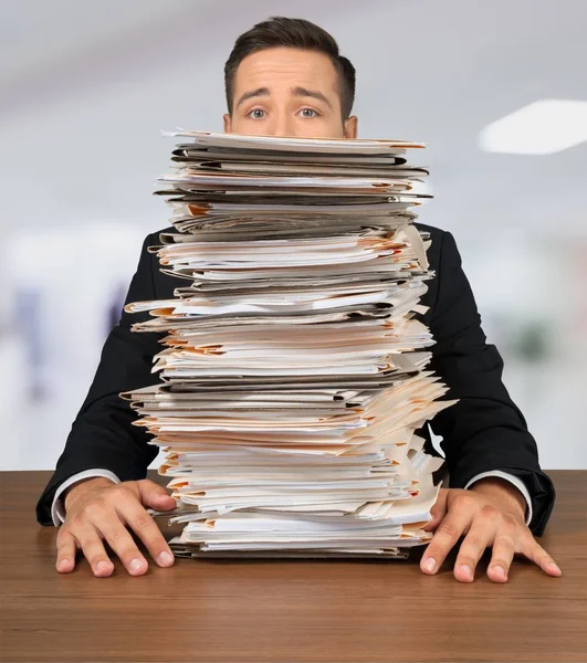 Overworked manager at workplace Stock Photo by ©billiondigital 187621802