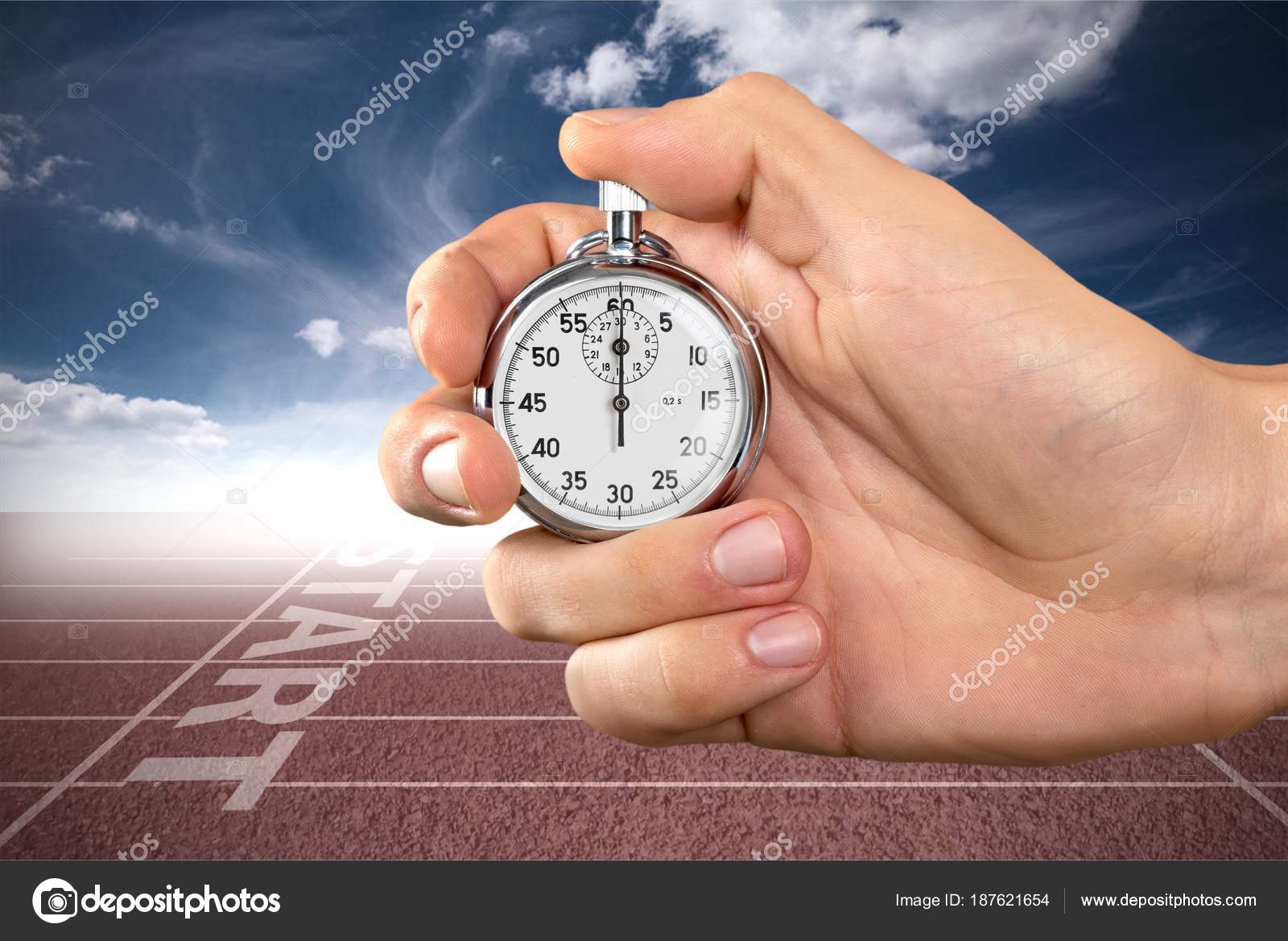 Stopwatch in Human Hand — Stock Photo © billiondigital #187621654