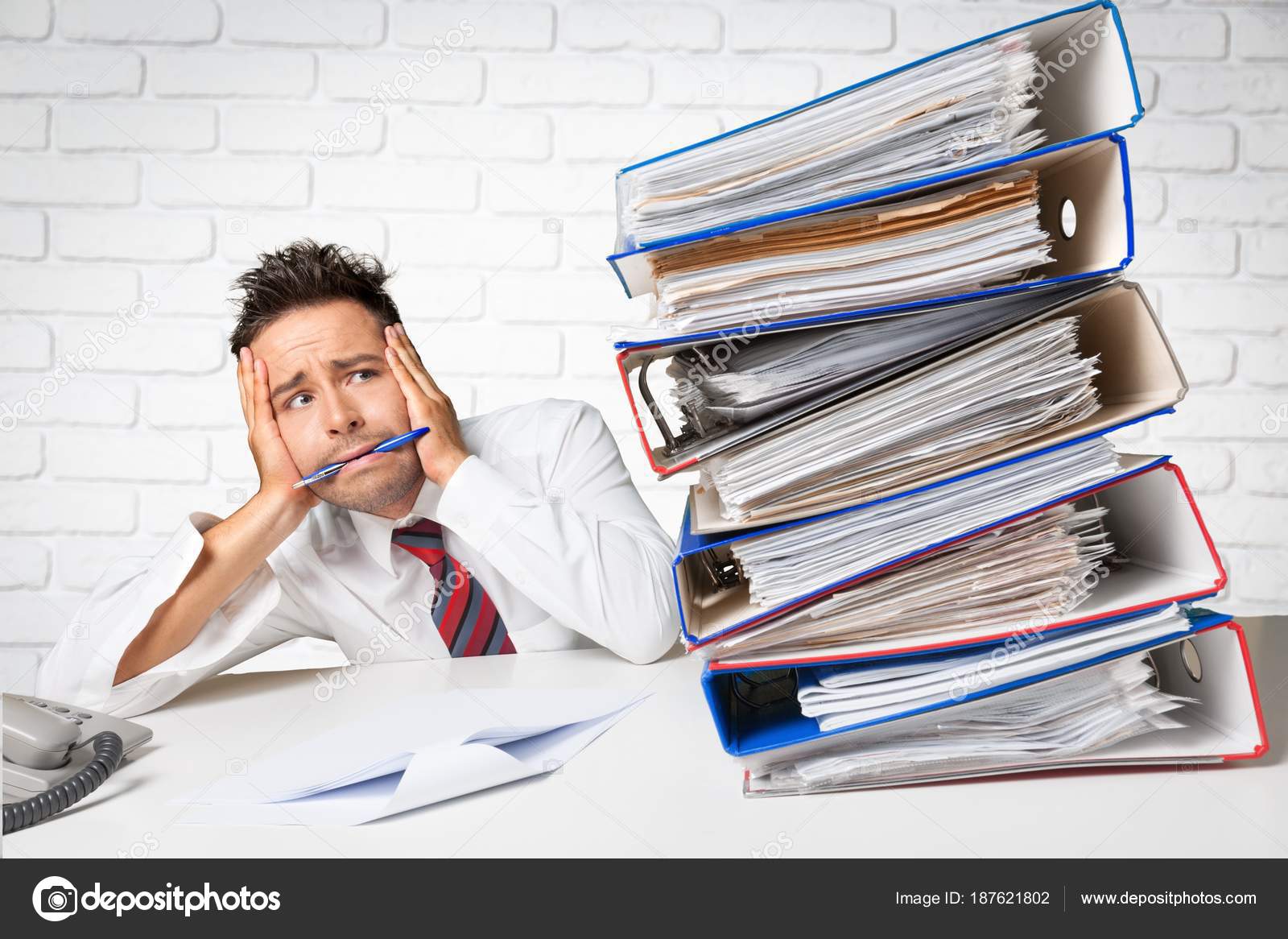 Overworked manager at workplace Stock Photo by ©billiondigital 187621802