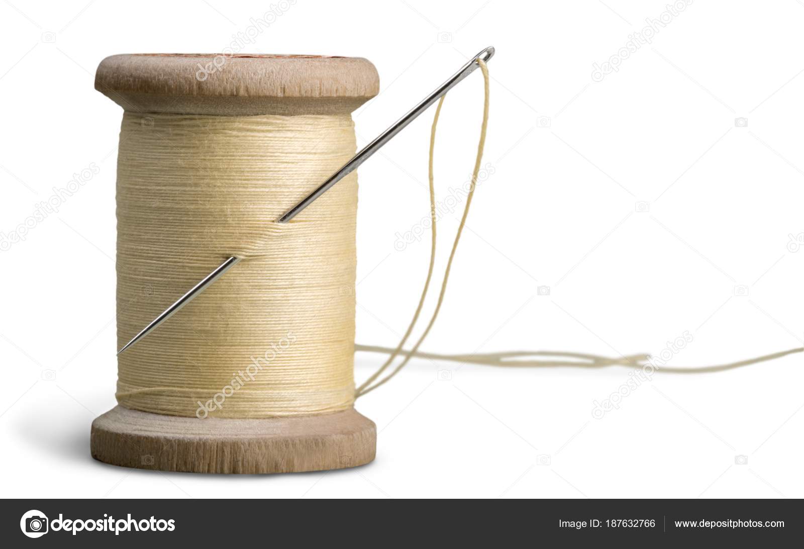 Bobbin of thread with needle — Stock Photo © billiondigital #187632766