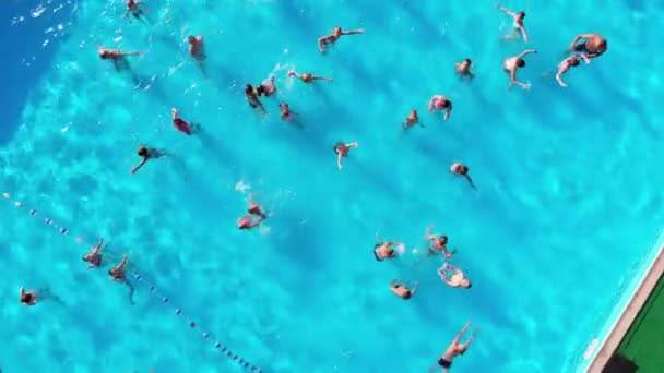 Top view of a Pool with Blue Water and Bathing Children. Water Surface ...