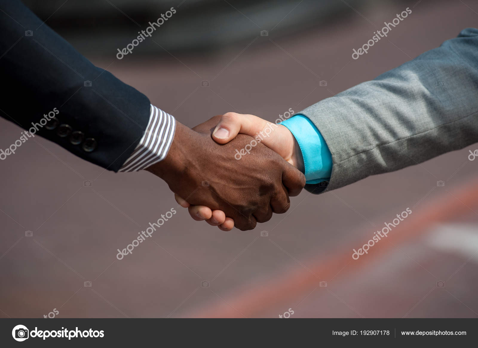 Different Races Shaking Hands