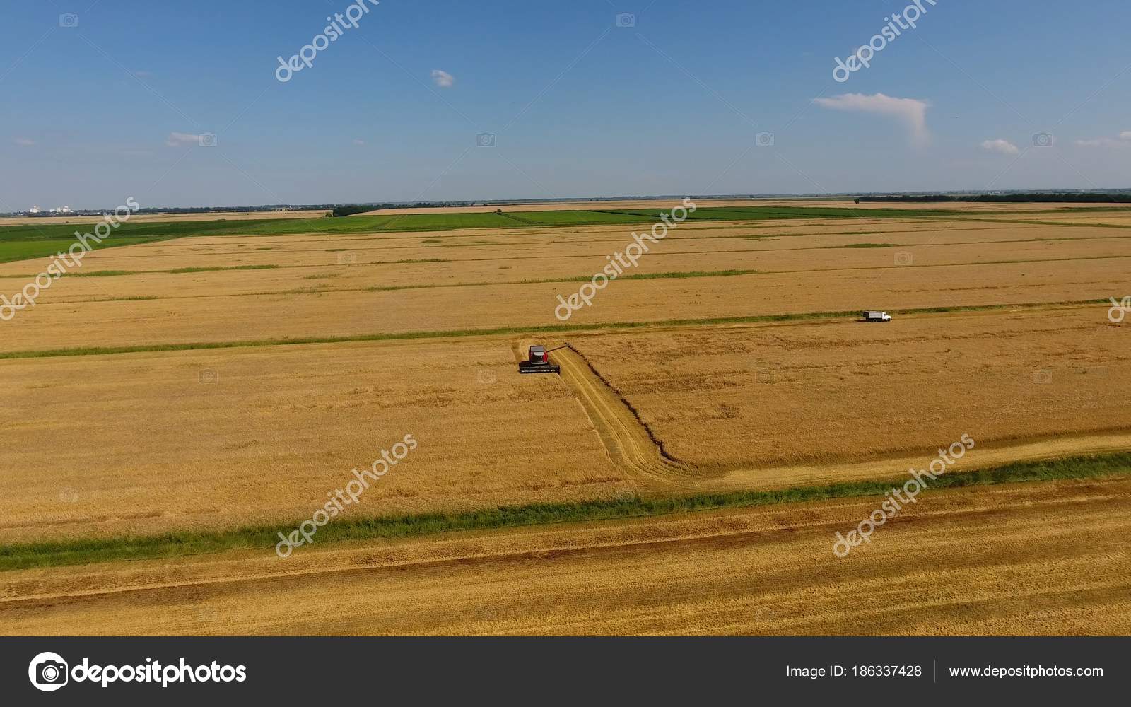 Harvesting barley harvesters. Fields of wheat and barley, the work of ...