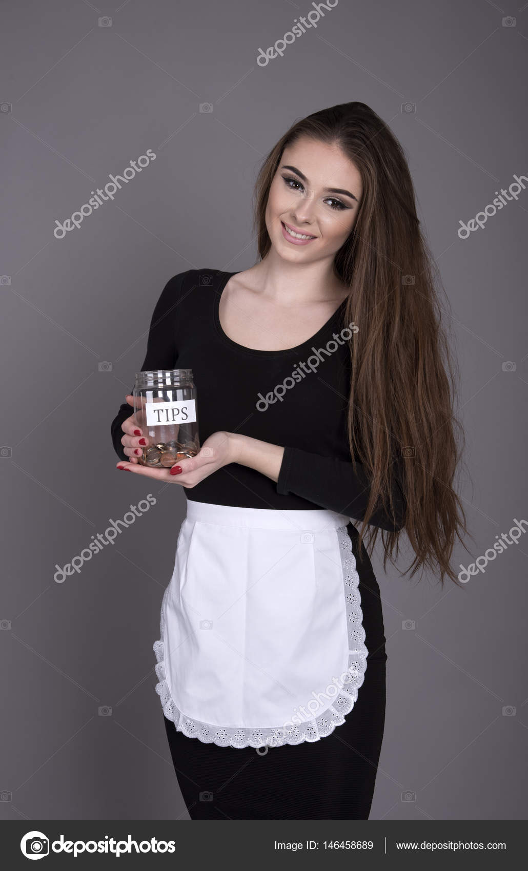Waitress counting money in a tips jar — Stock Photo © petertt #146458689