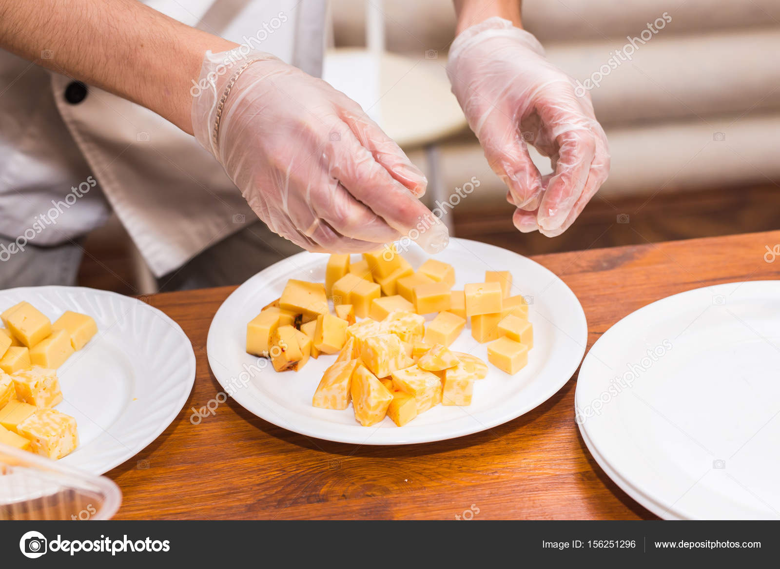 Close-up of chef cooking food kitchen restaurant cutting cook hands ...