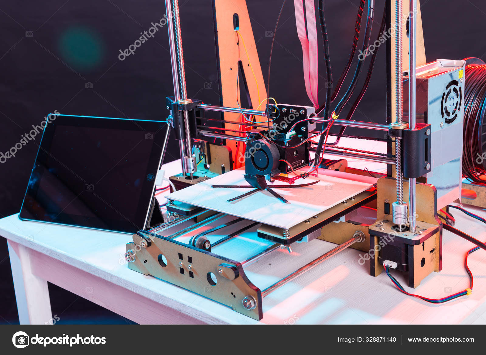 Electronic three dimensional plastic printer during work in laboratory ...