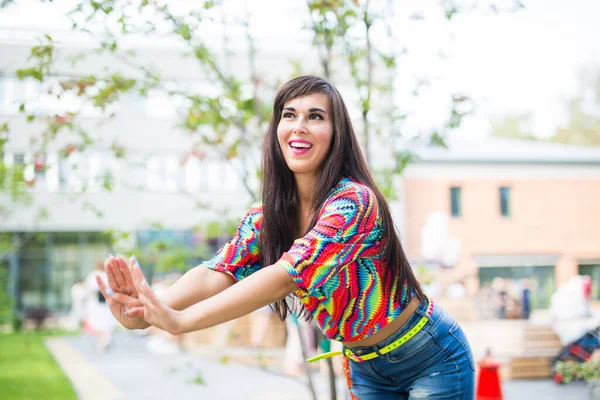 Street shaabi dance and urban dancer concept - Cheerful belly dancer ...