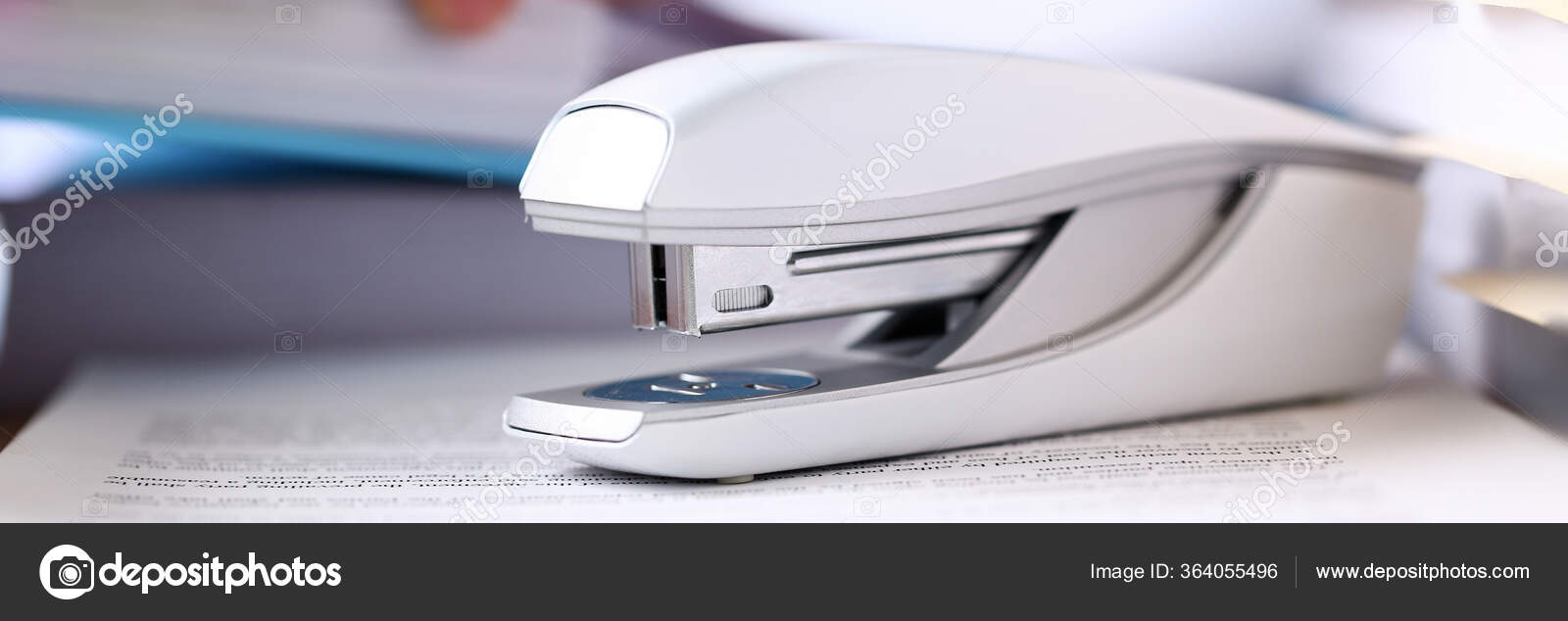 White stapler on workplace Stock Photo by ©megaflopp 364055496