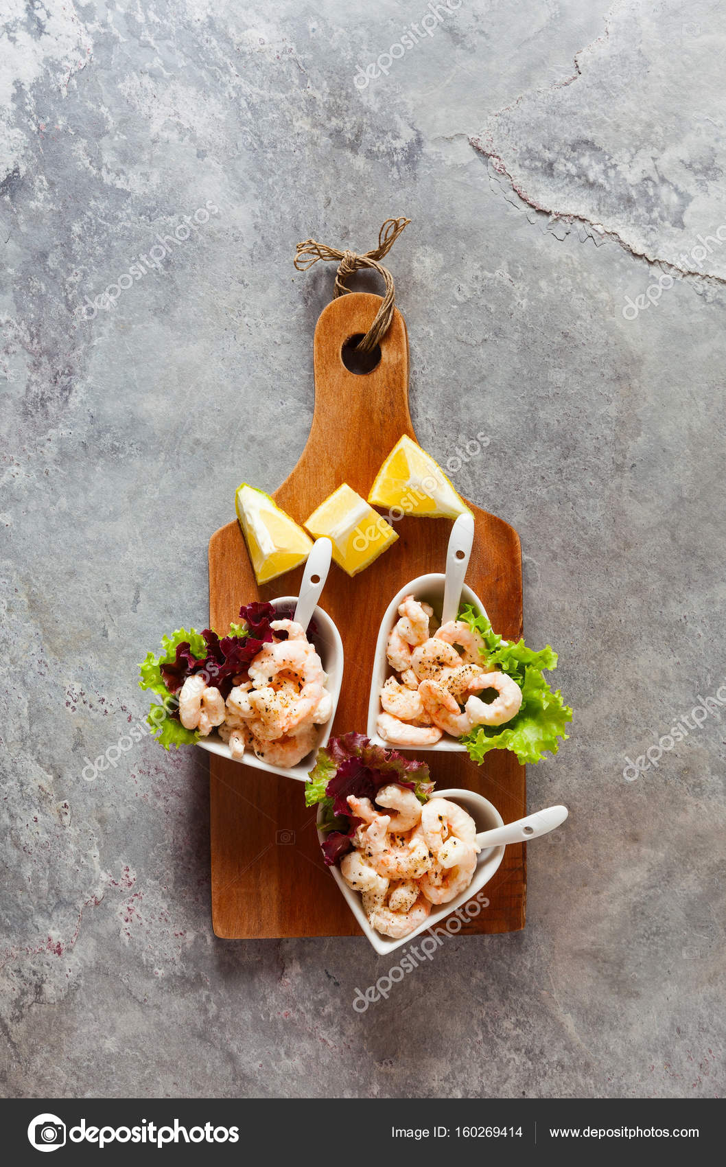 Prawn cocktail in serving bowls in the form of hearts on a gray Stock ...