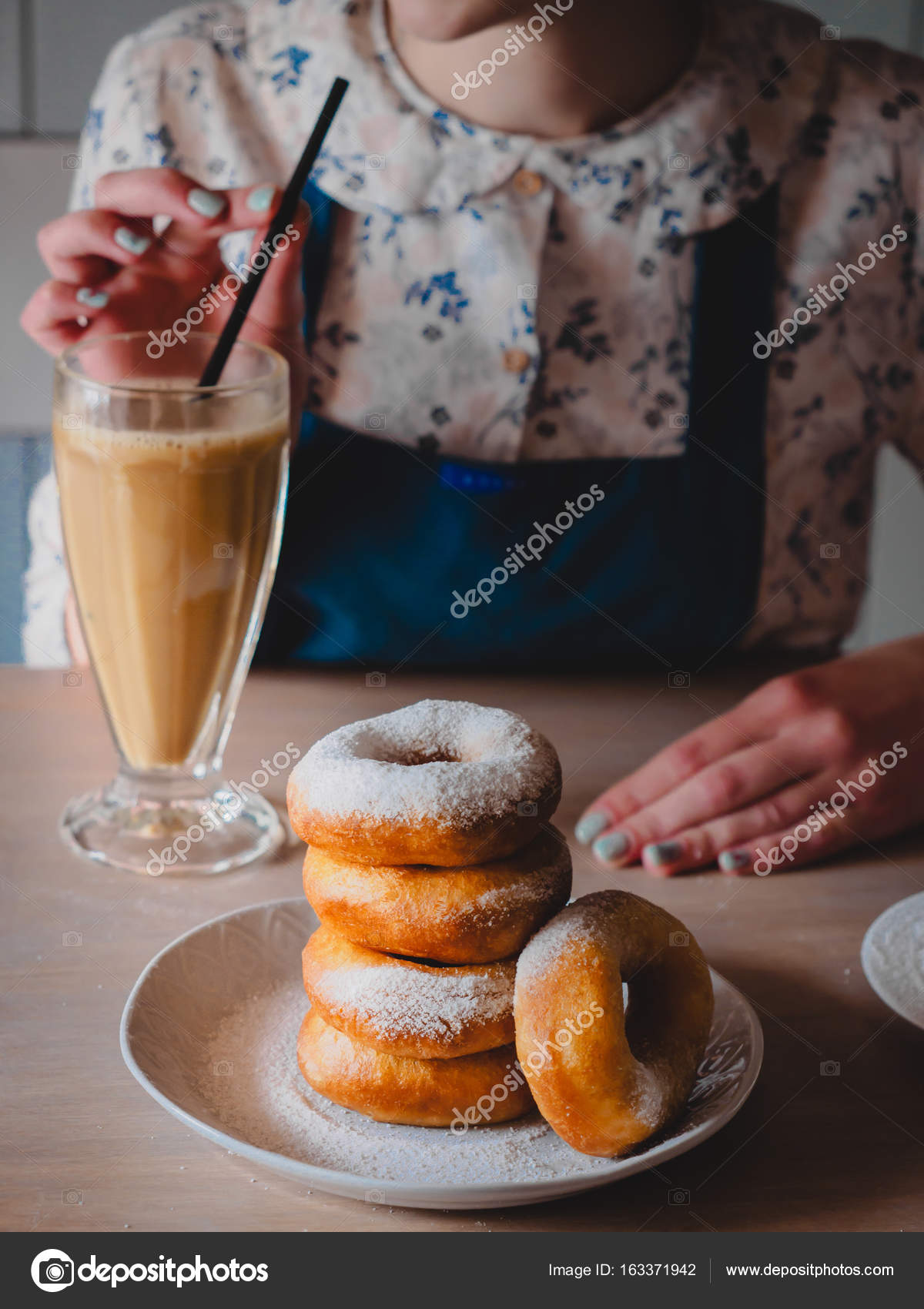 Pishki - Russian Doughnuts fried in oil dusted with sugar powder, girl ...
