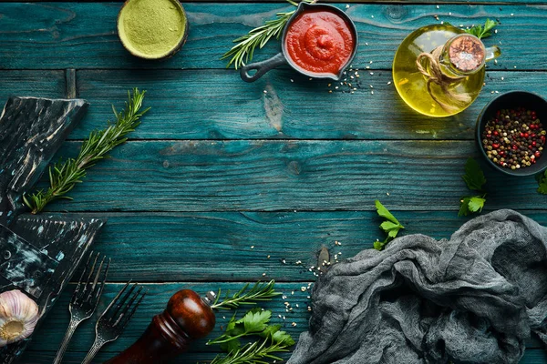 Black cooking background. Vegetables and spices on the table. Top view ...