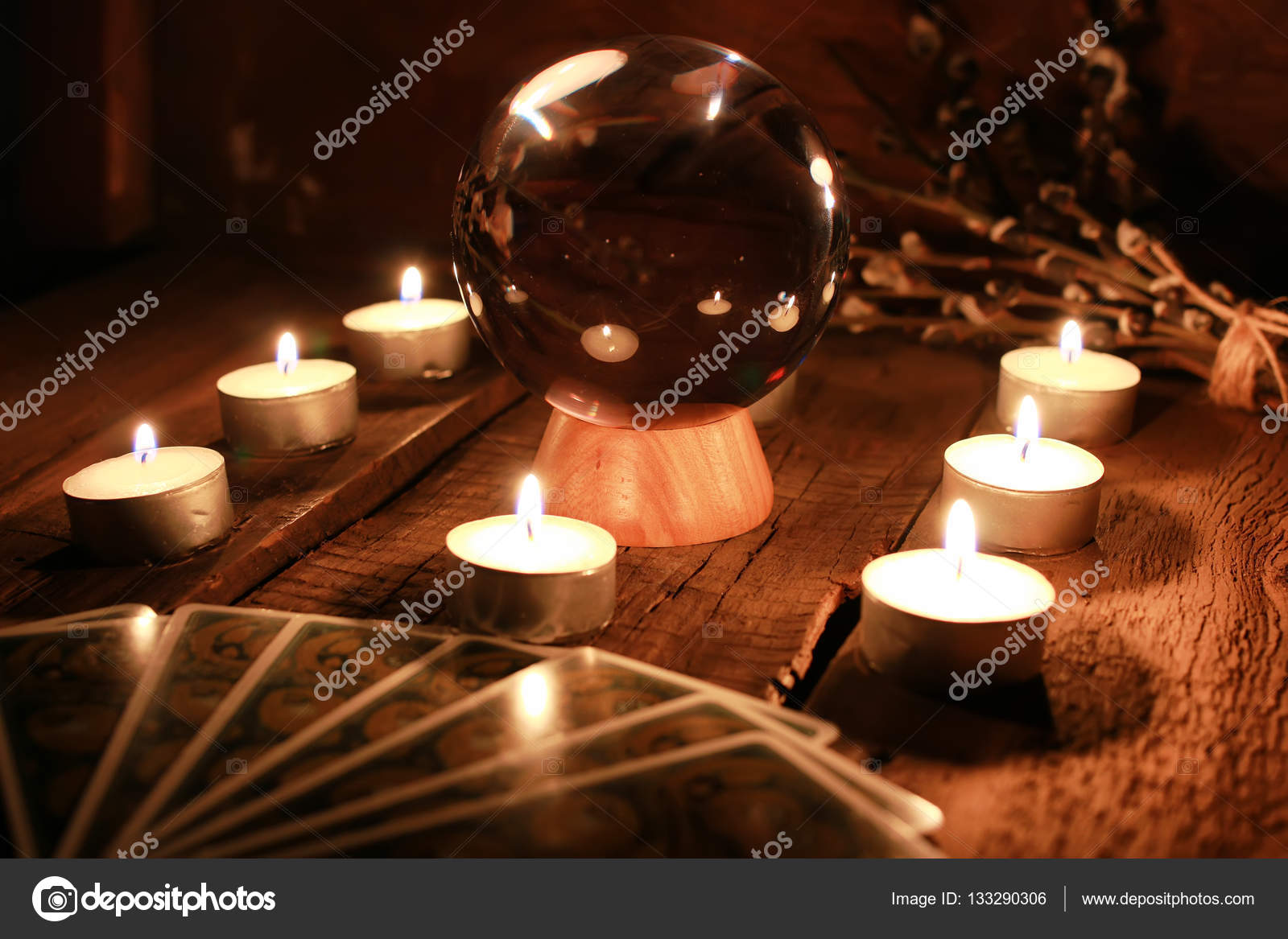 Candle divination tarot cards Stock Photo by ©alexkich 133290306