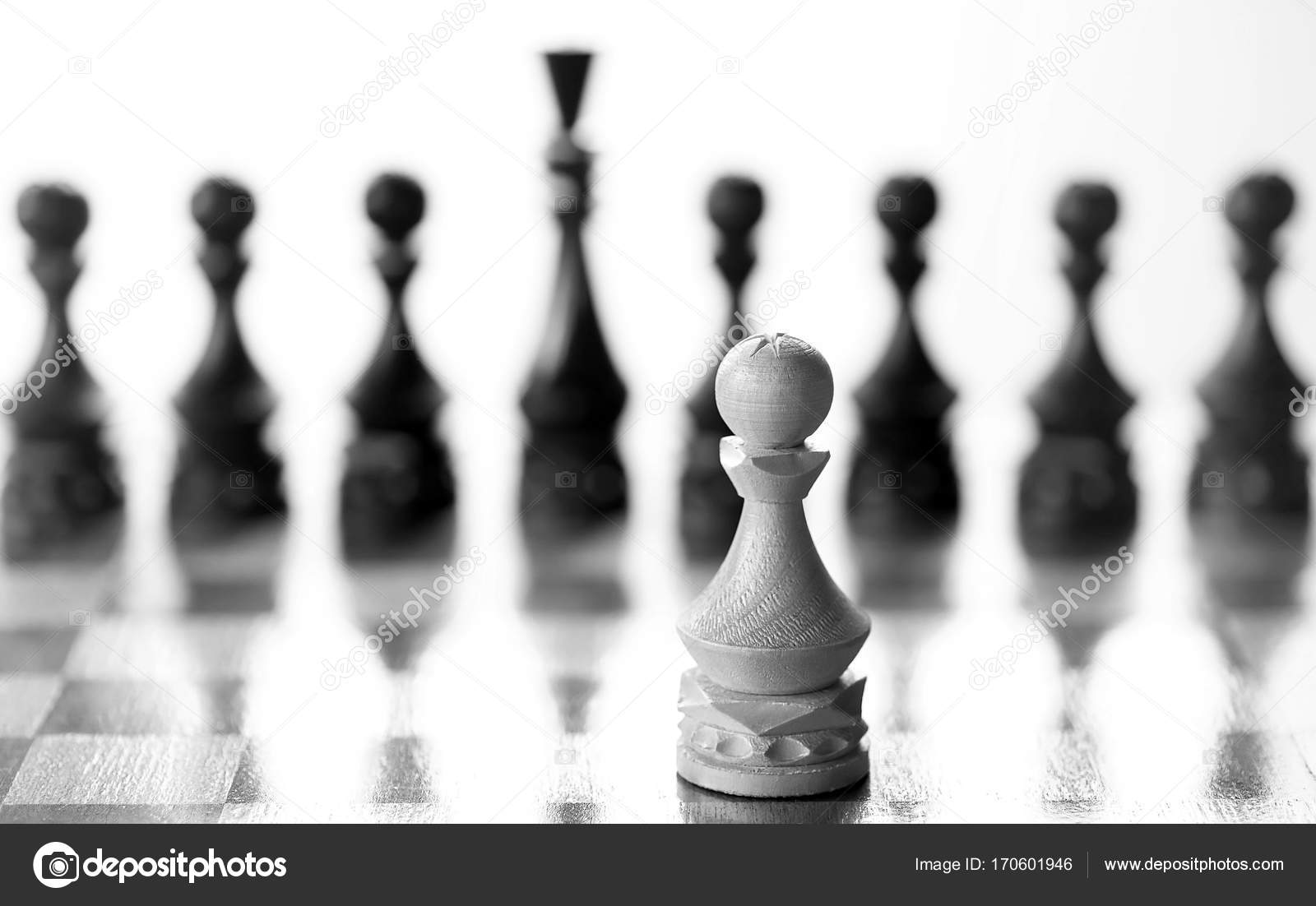 Chess piece pawn on board Stock Photo by ©alexkich 170601946