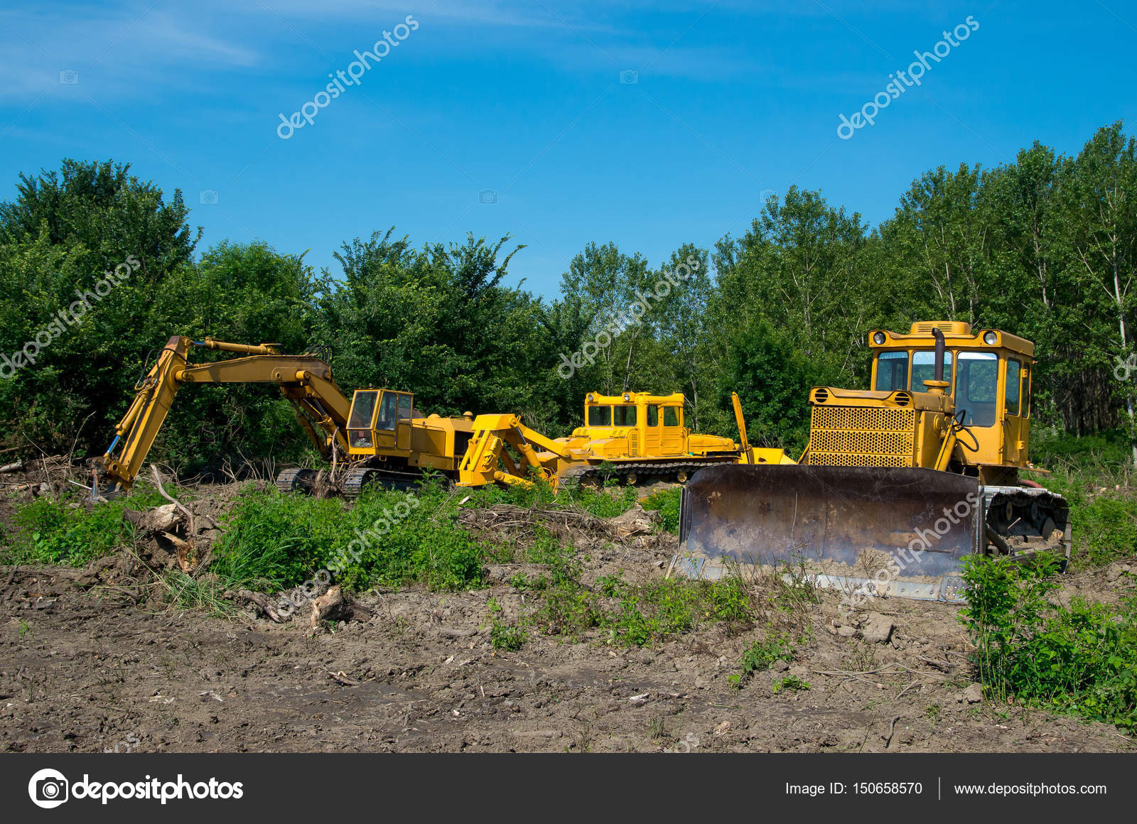 Excavator and bulldozer clearing forest land. Stock Photo by ...