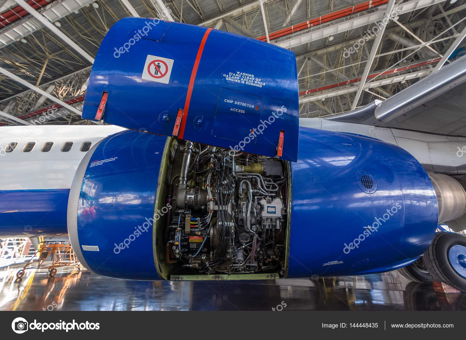 Jet engine maintenance Stock Photo by ©Domkrugom 144448435