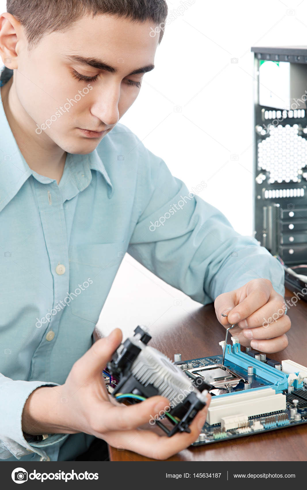 Young computer engineer Stock Photo by ©zavgsg 145634187