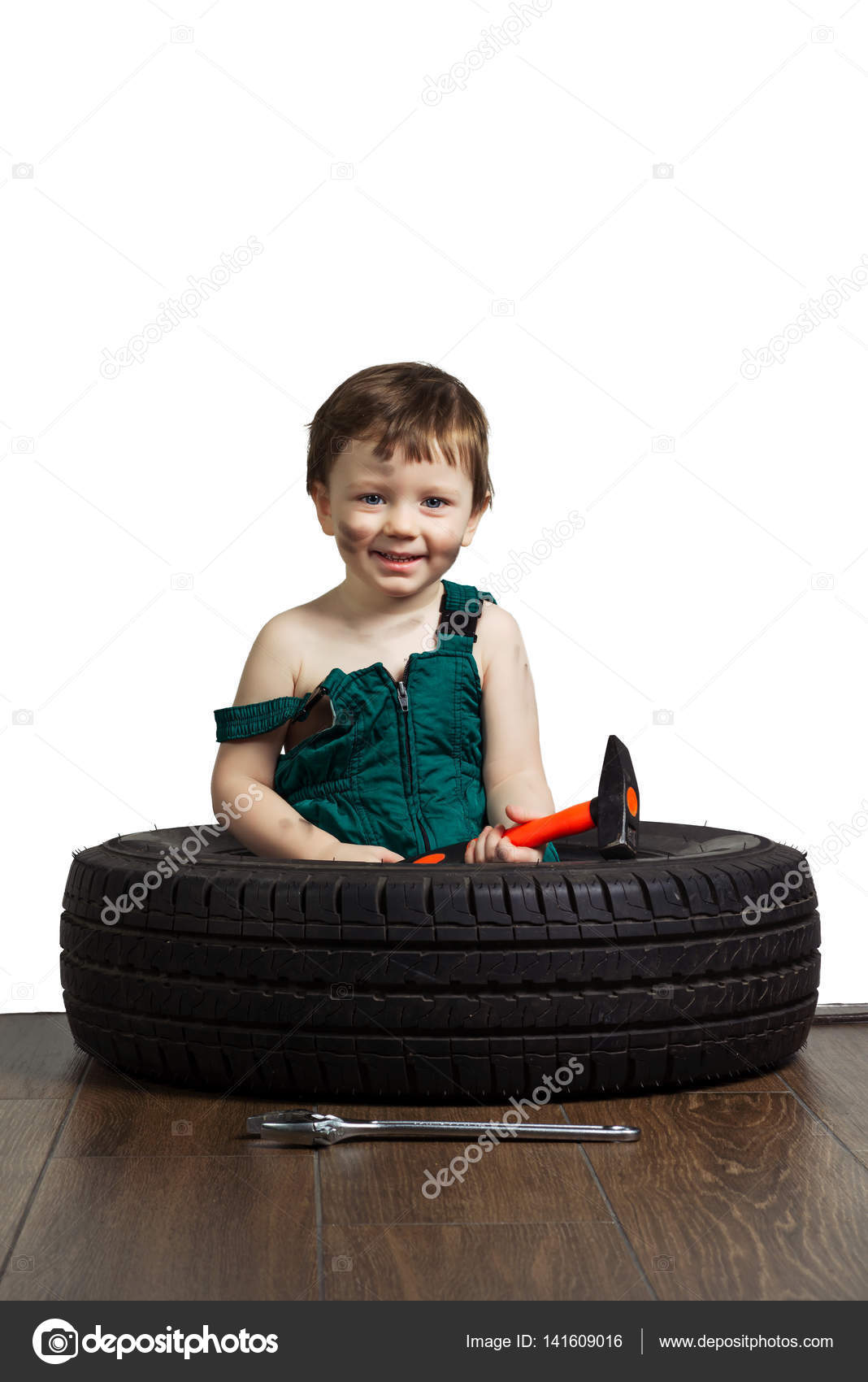Little boy mechanic Stock Photo by ©Tonicav 141609016