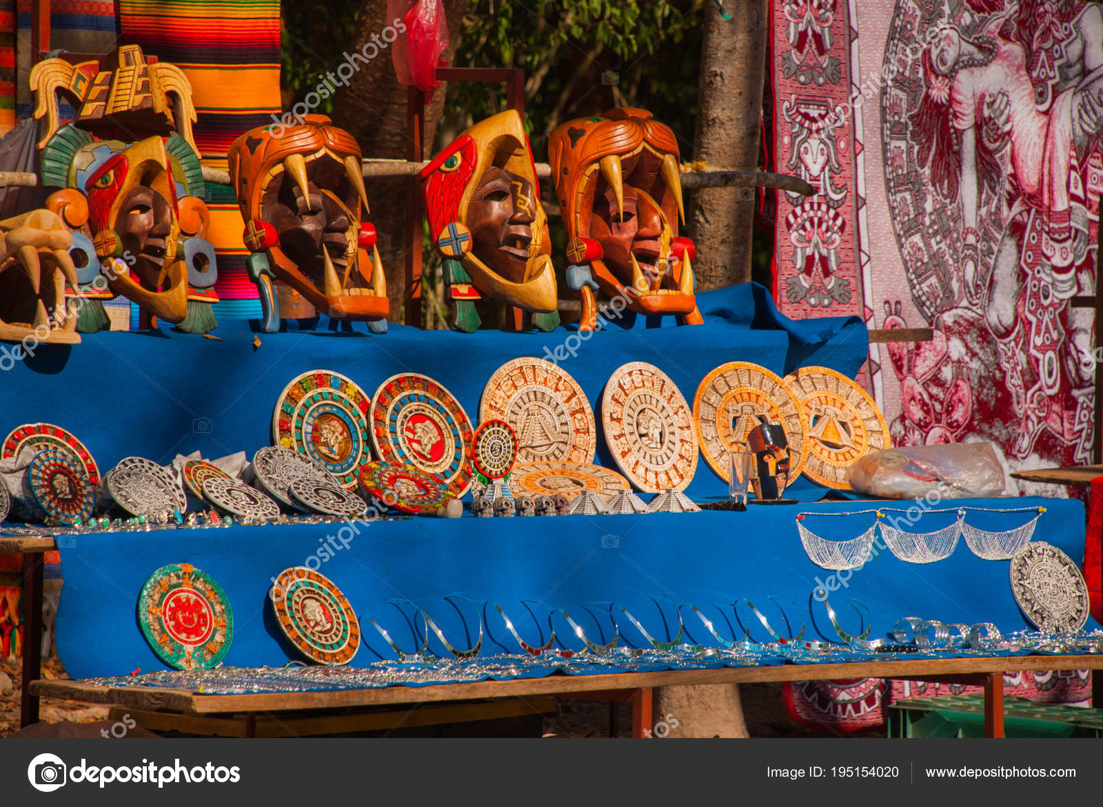 Souvenirs from Mexico in the market. Mexican Mayan crafts, embroidery ...