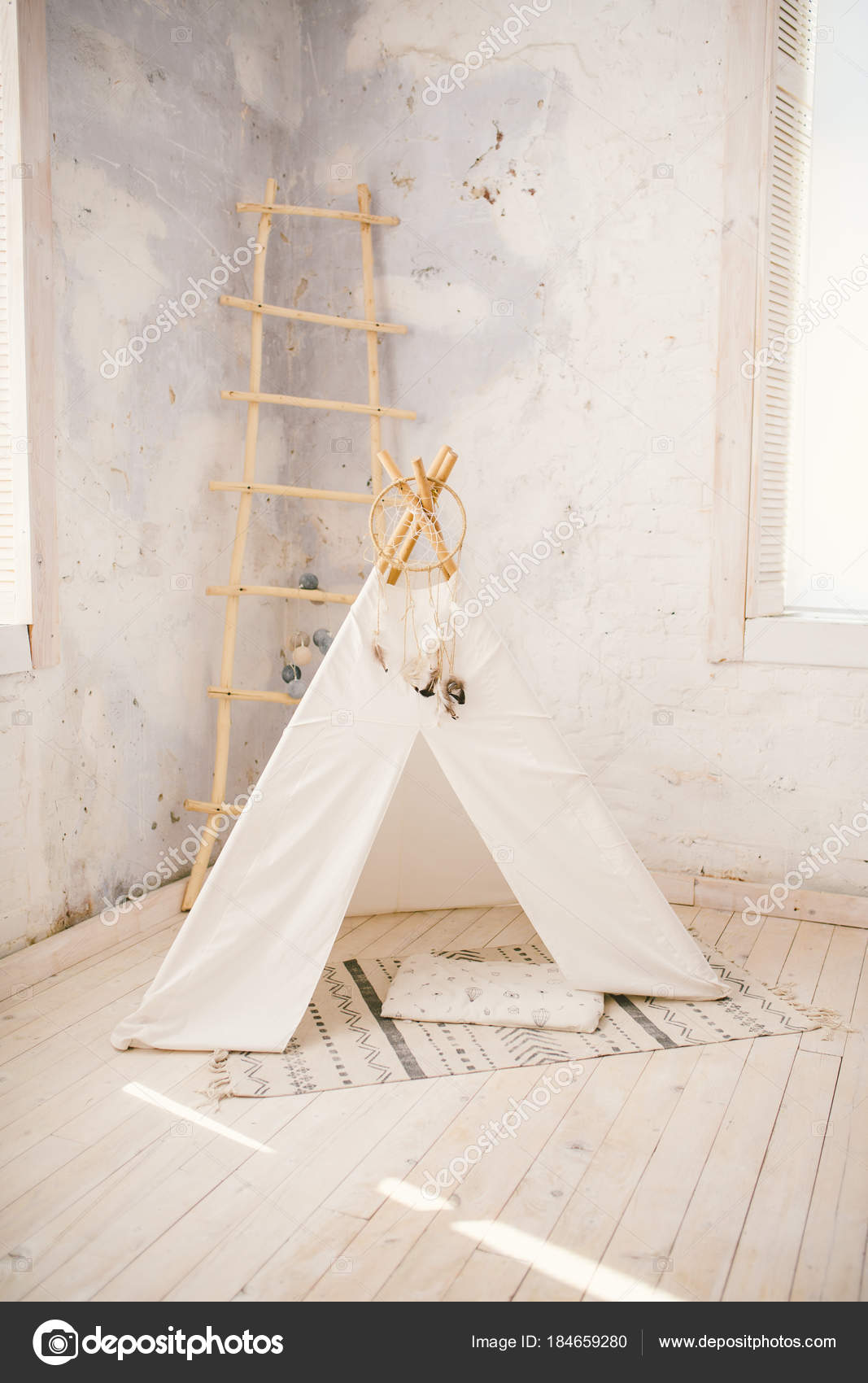 Childen's room corner with a beautifully decorated play tipi tent and a ...