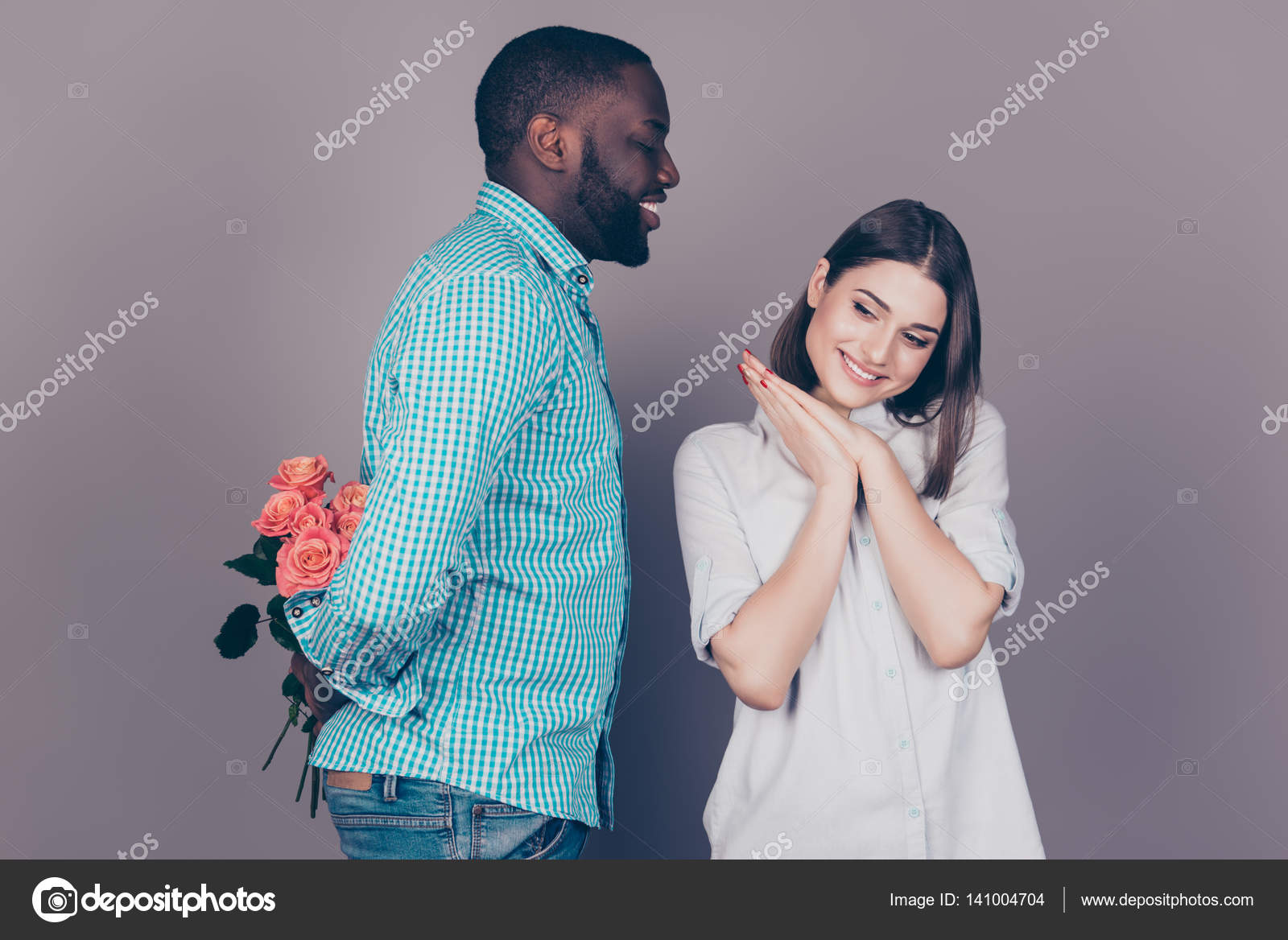 Two mixed race people at date. Handsome afro american guy hide — Stock ...