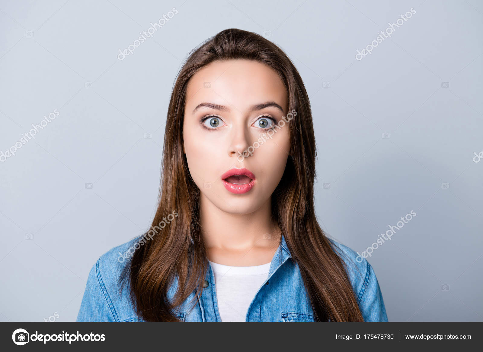 What?! Close up portrait of young shocked manager with wide open Stock ...