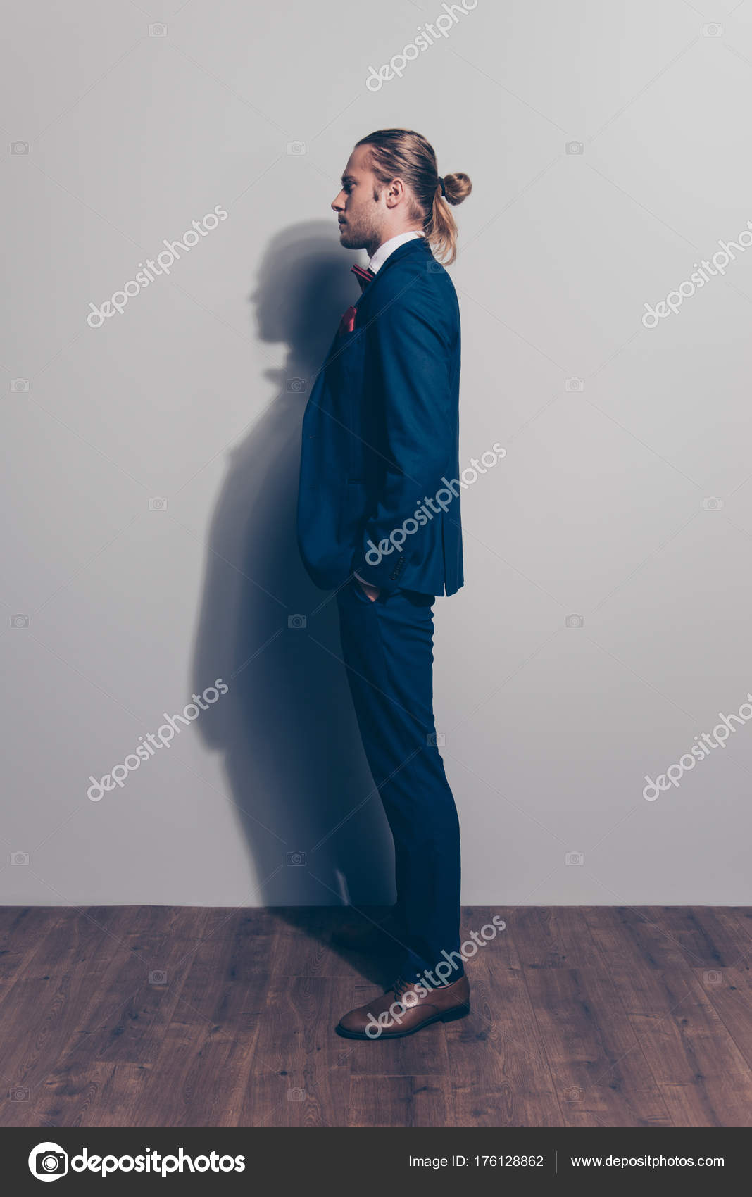 Full length side view portrait of man in formal wear outfit with Stock ...